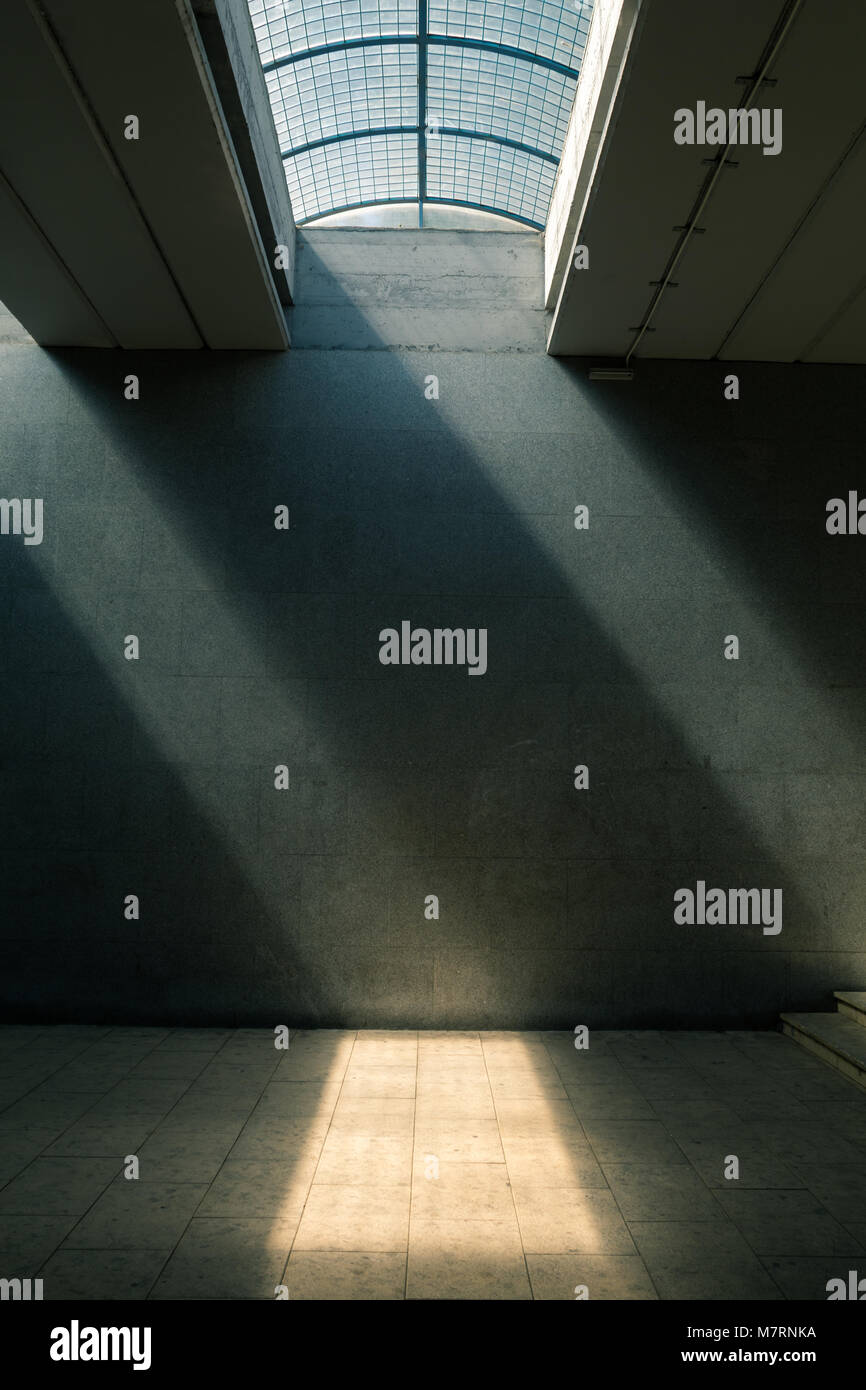 Modern urban passage with dramatic light Stock Photo - Alamy