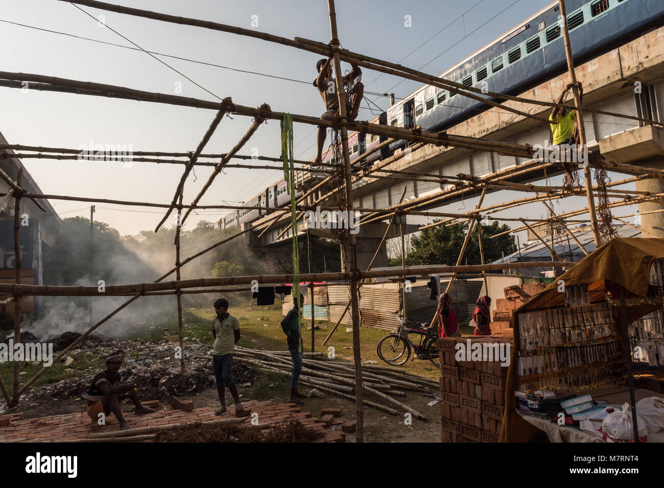 Men working on scaffolding in preparation for the Sonepur Mela, Sonepur ...