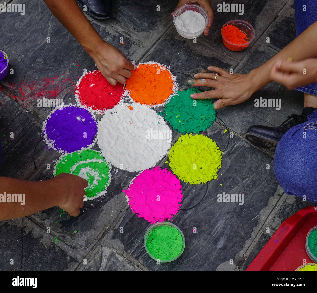 Nepalese people painting art from sand colors during festival Stock ...