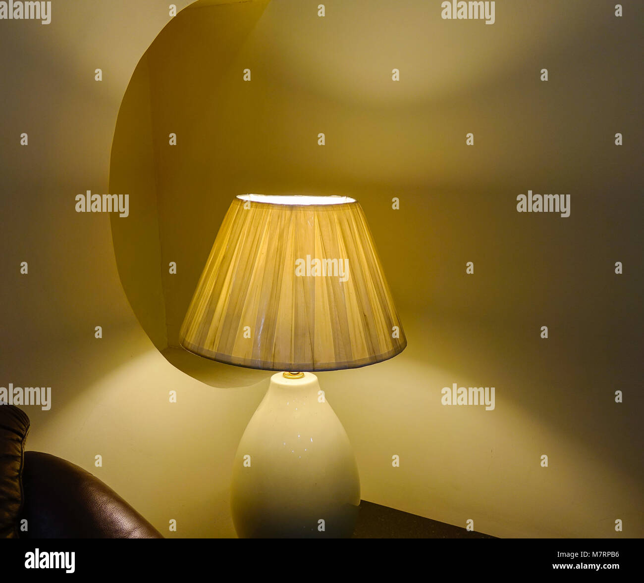 Elegant lamp with yellow light at living room of modern house Stock ...