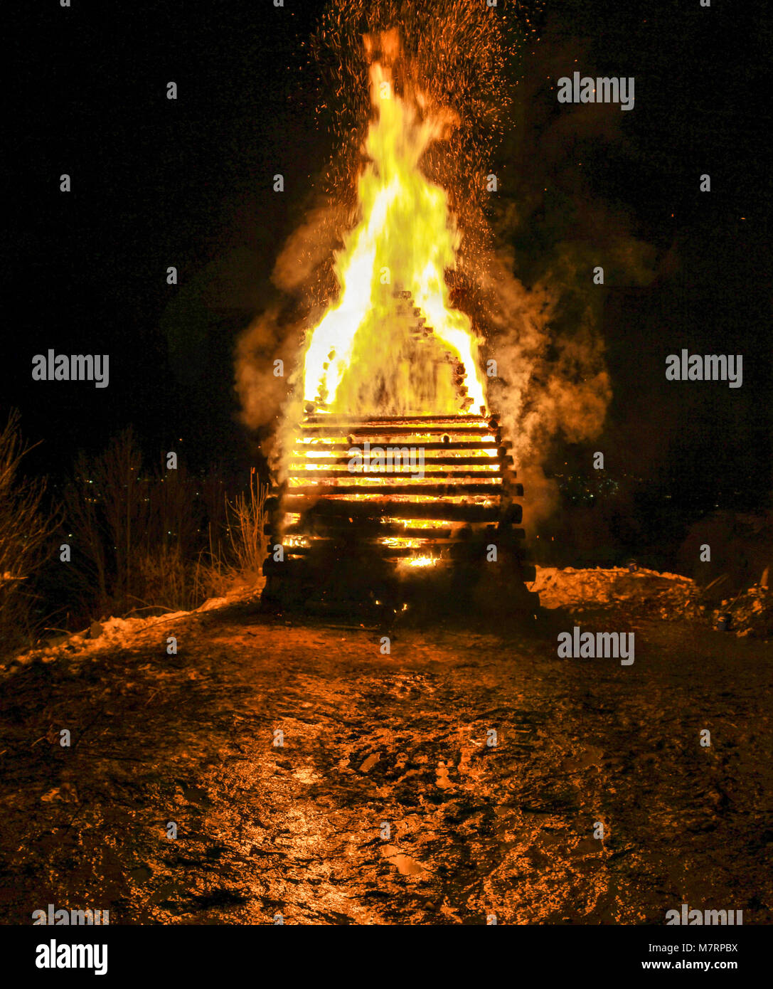 Big huge traditional fire. Burning of witches in a bonfire. Profane ...
