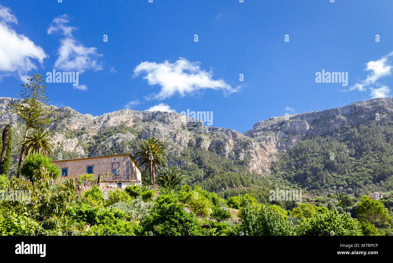 Traditional stone house with garden in mountain village Deia, Majorca ...