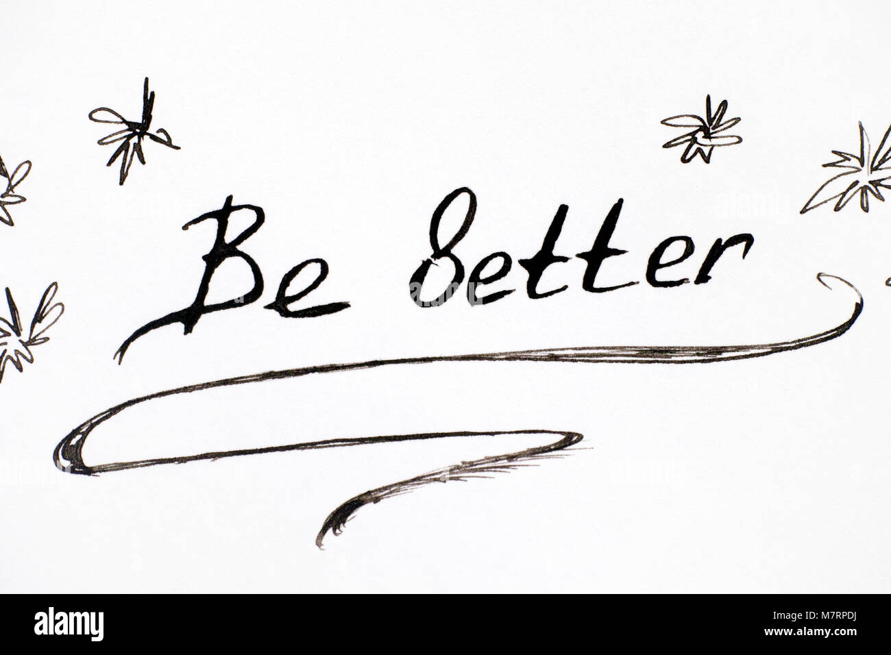 Handwriting phrase Be Better. Close-up Stock Photo - Alamy