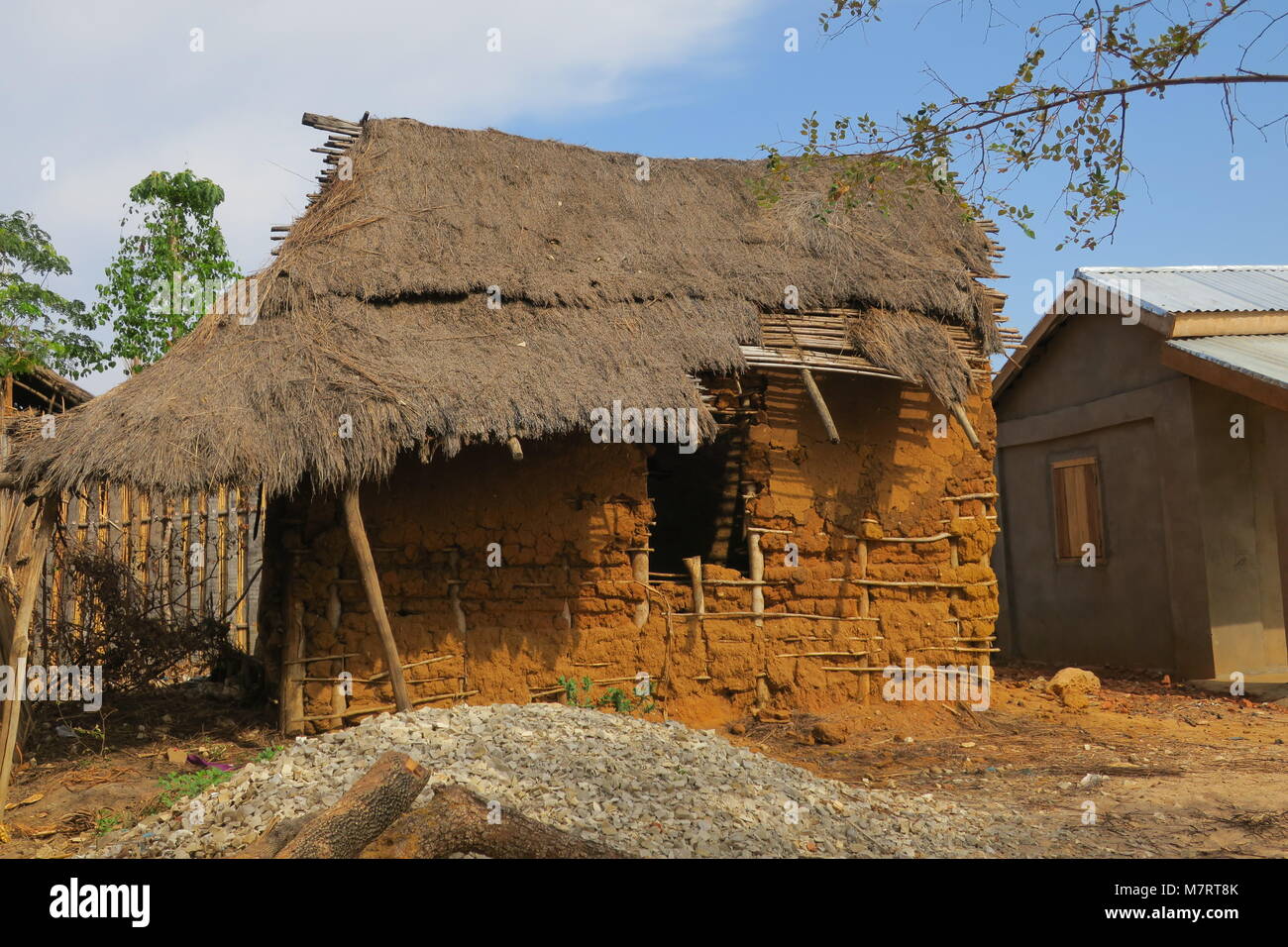 Poverty in Malagasy village. Small simple home on countryside of ...