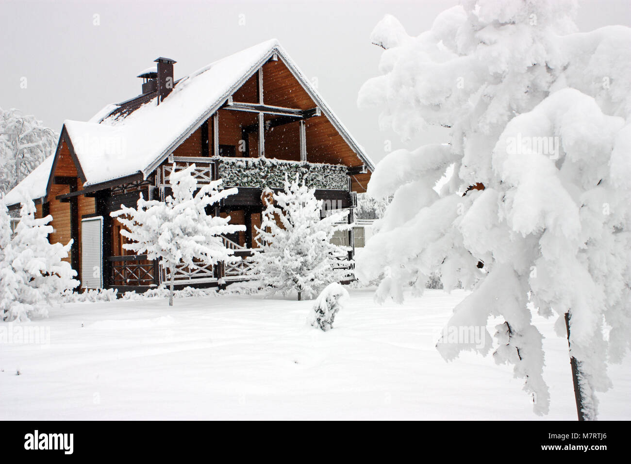 View of beautiful winter landscape with snow house Stock Photo - Alamy