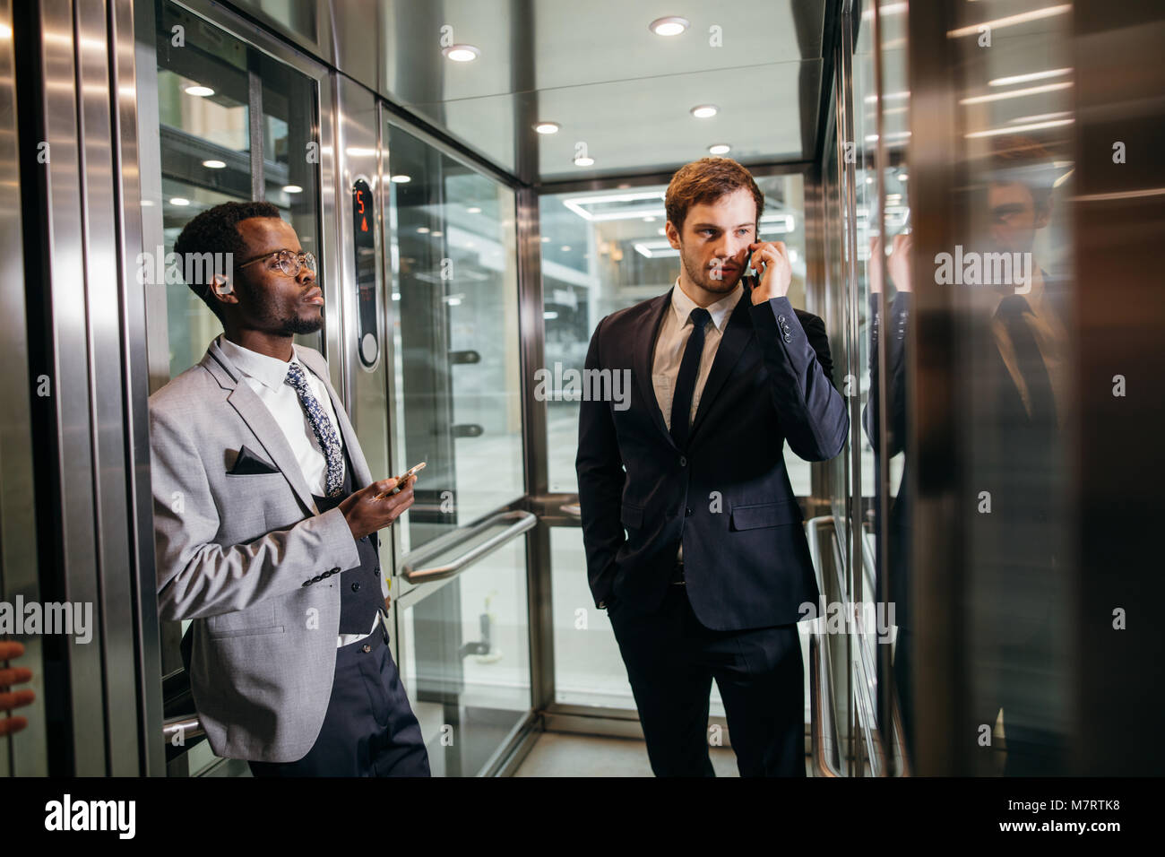 People Standing In Elevator