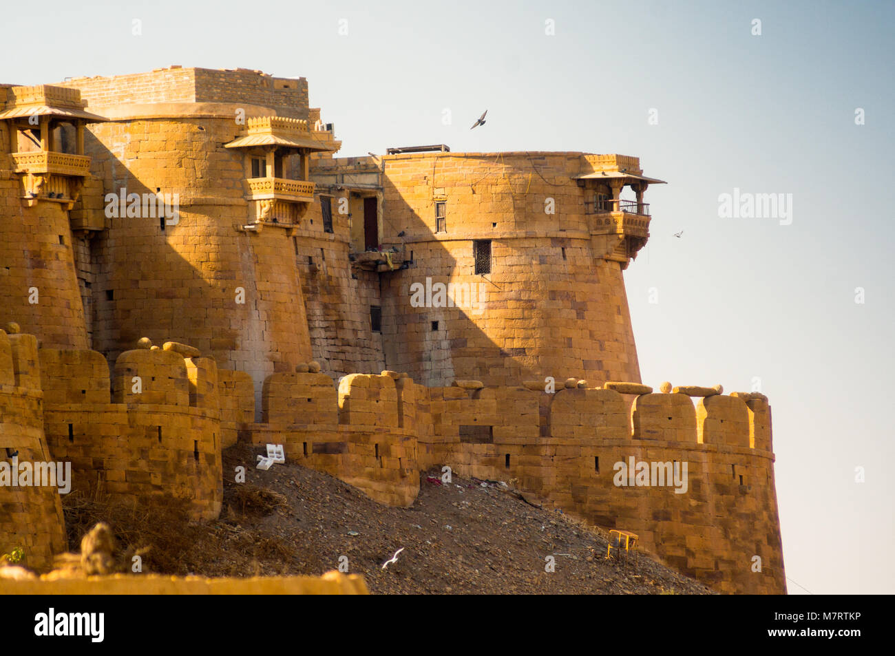 Curved sandstone walls of the famed golden fort in Jaisalmer rajasthan ...