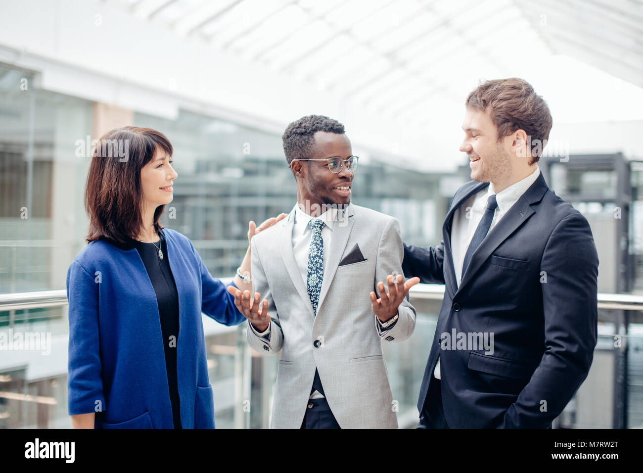 Patting shoulder hi-res stock photography and images - Alamy