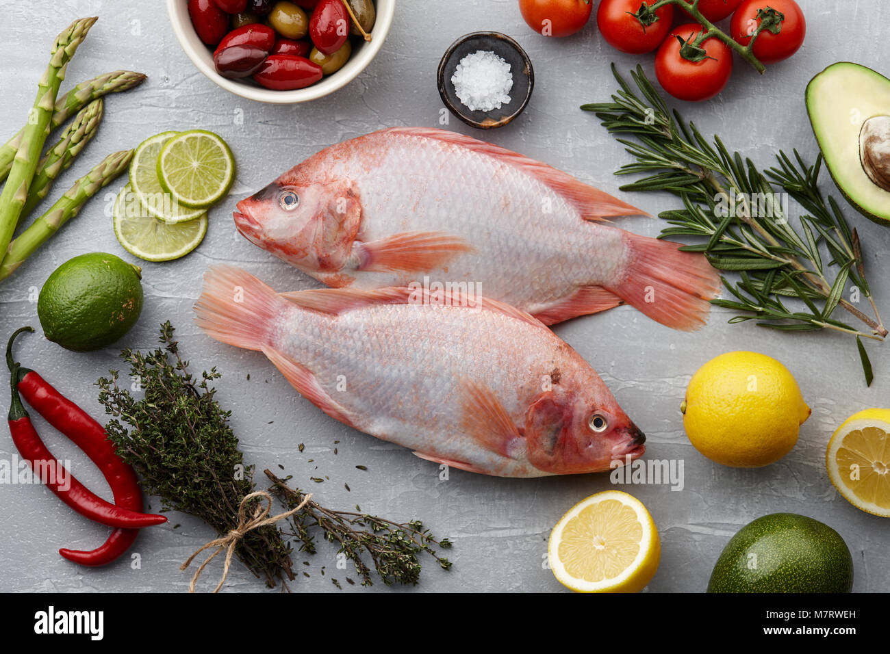 Red tilapia hi-res stock photography and images - Alamy