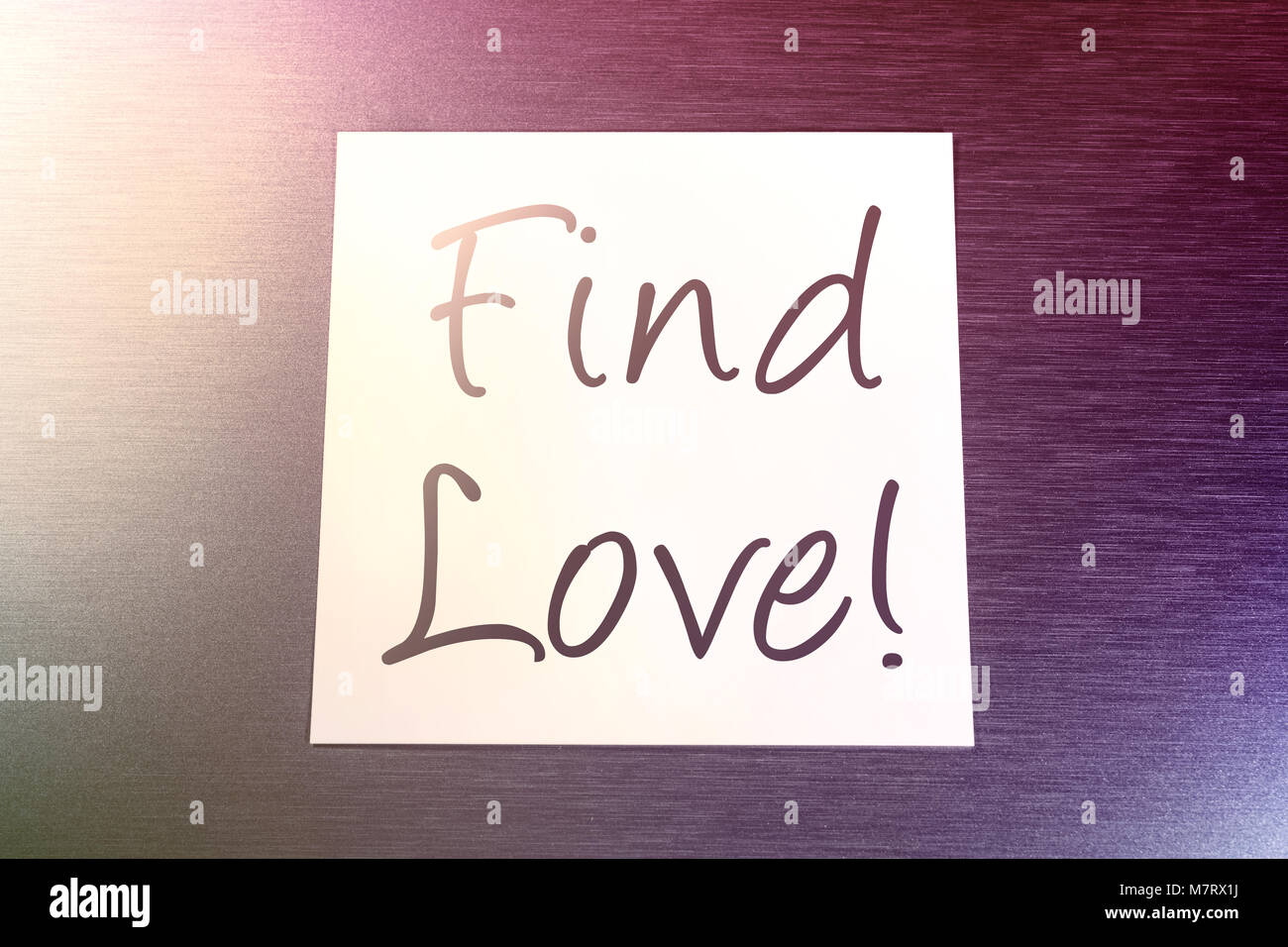 Find Love Reminder On Paper Lying On Brushed Aluminum Stock Photo - Alamy