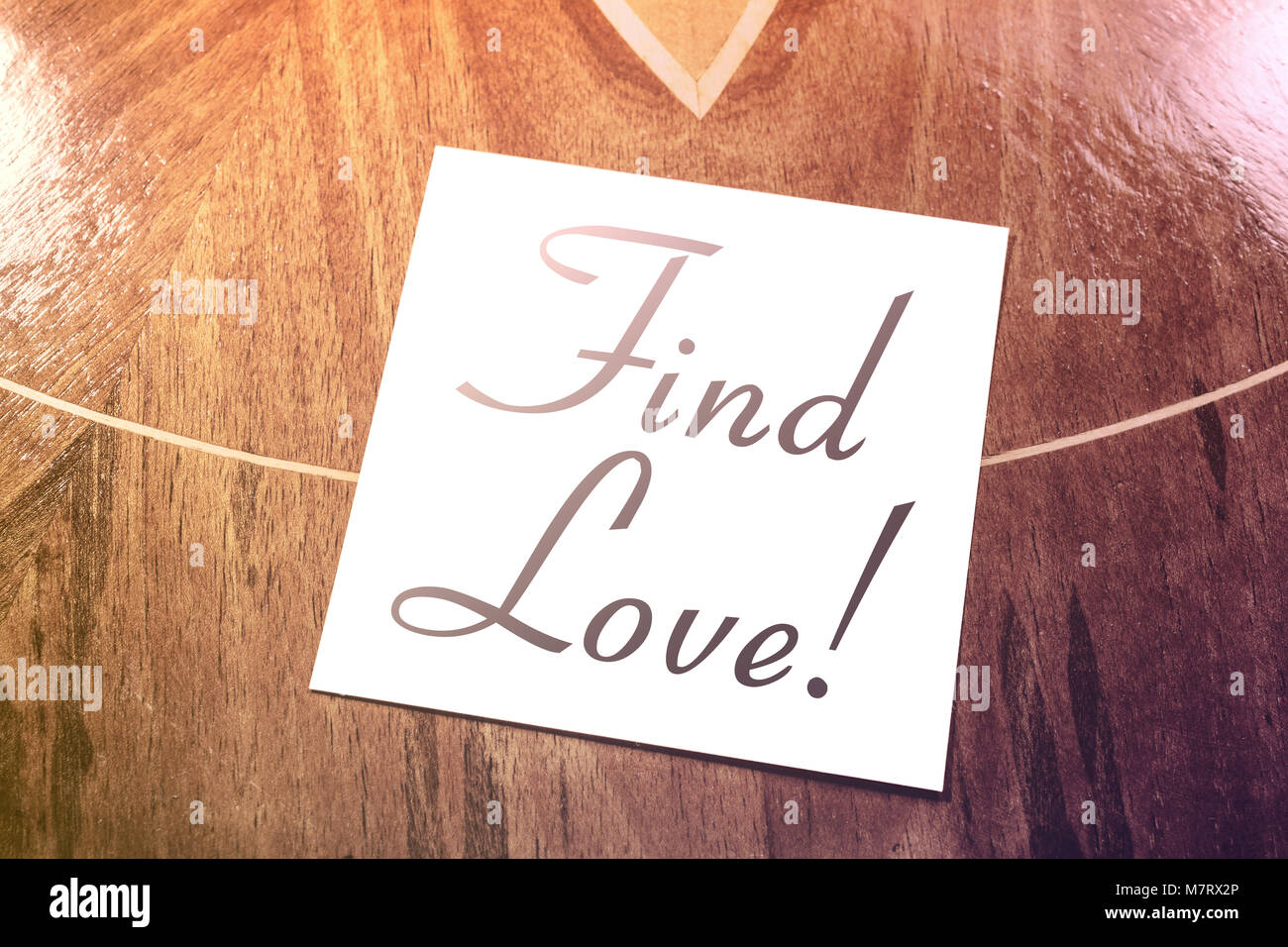 Find Love Reminder On Paper Lying On Wooden Table Stock Photo - Alamy