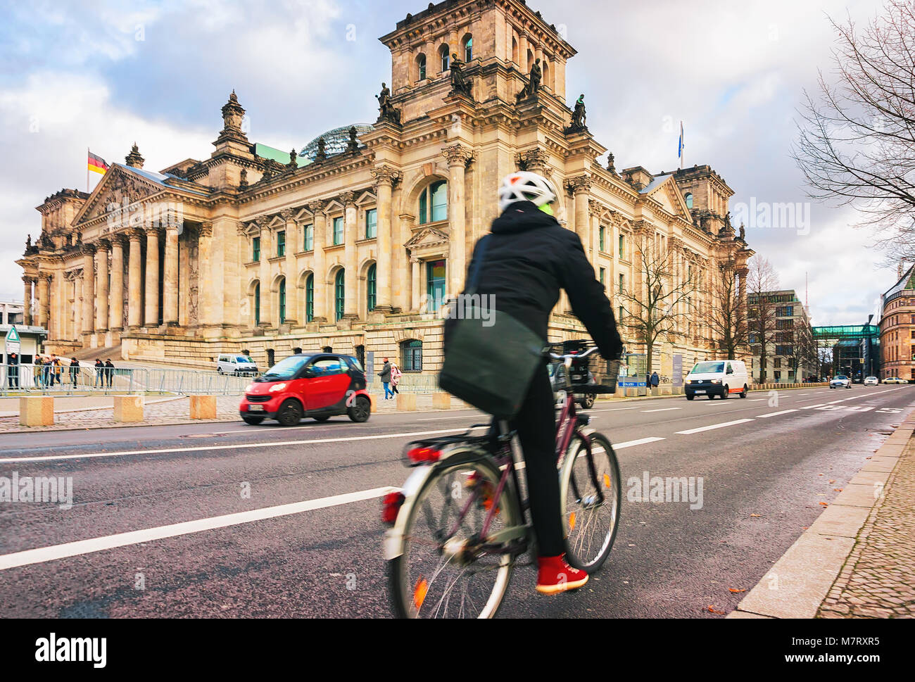 Berlin, Germany - December 8, 2017: Man on bicycle at Reichstag in ...