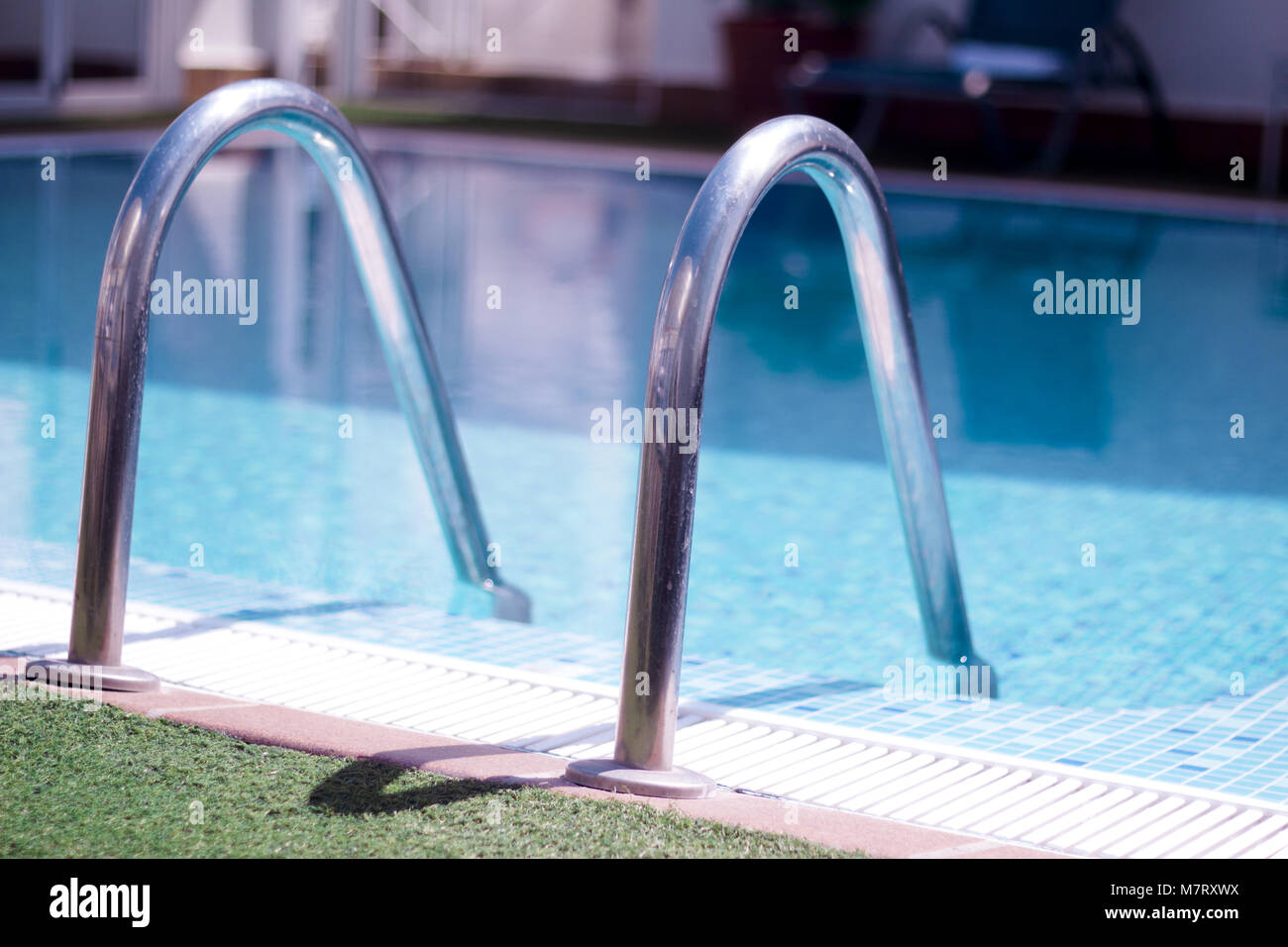 Summer pool with crystal clear water Stock Photo - Alamy