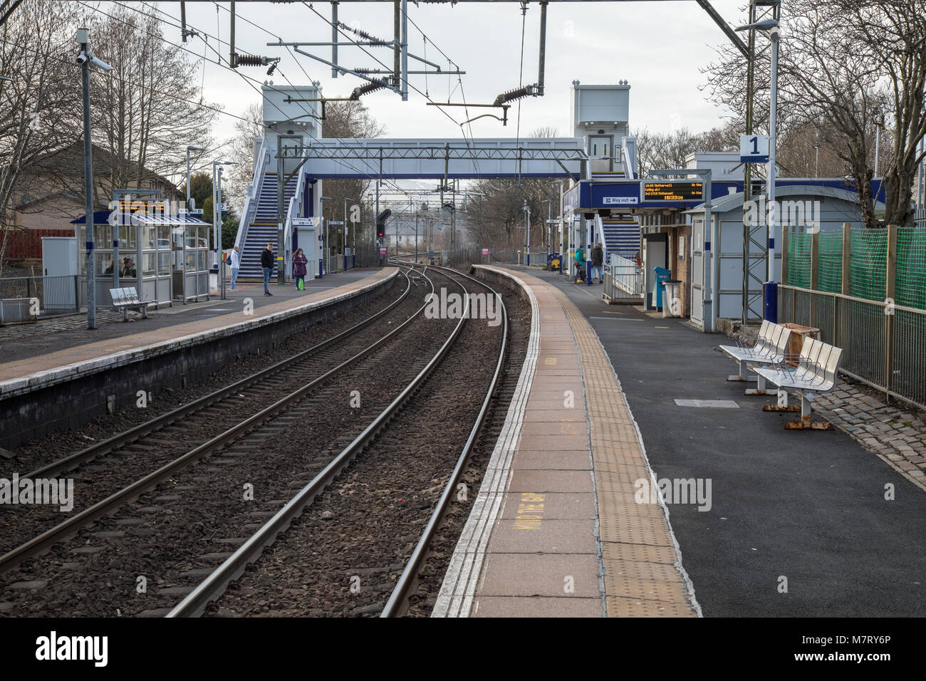 Westerton train station in Glasgow. This a westbound view, the next ...