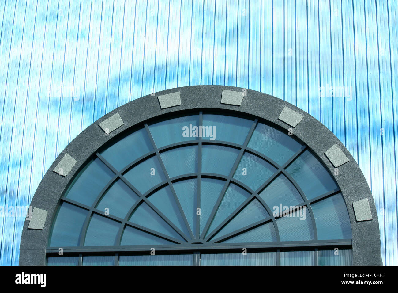 A Arched window in a building Stock Photo - Alamy