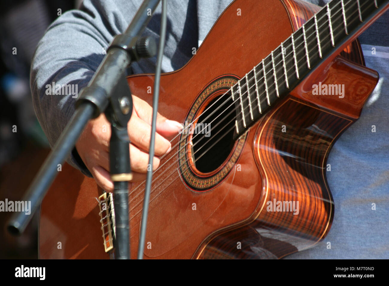 A Man playing a acoustic guitar Stock Photo - Alamy