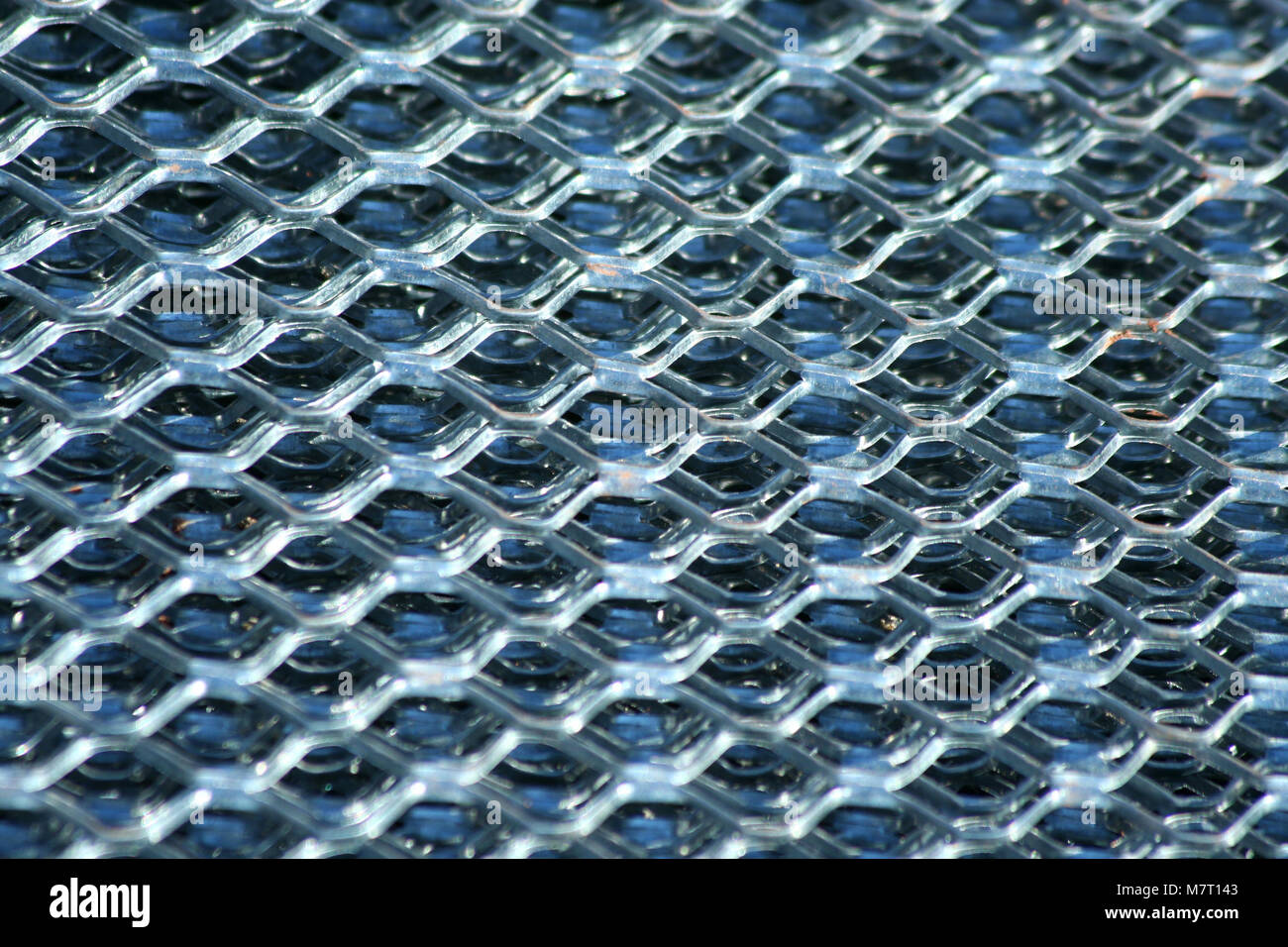 A silver metal fence background Stock Photo - Alamy
