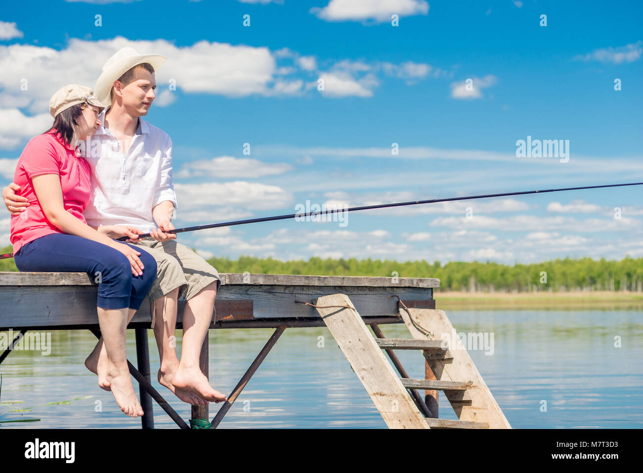 Romantic couple fishing hi-res stock photography and images - Alamy