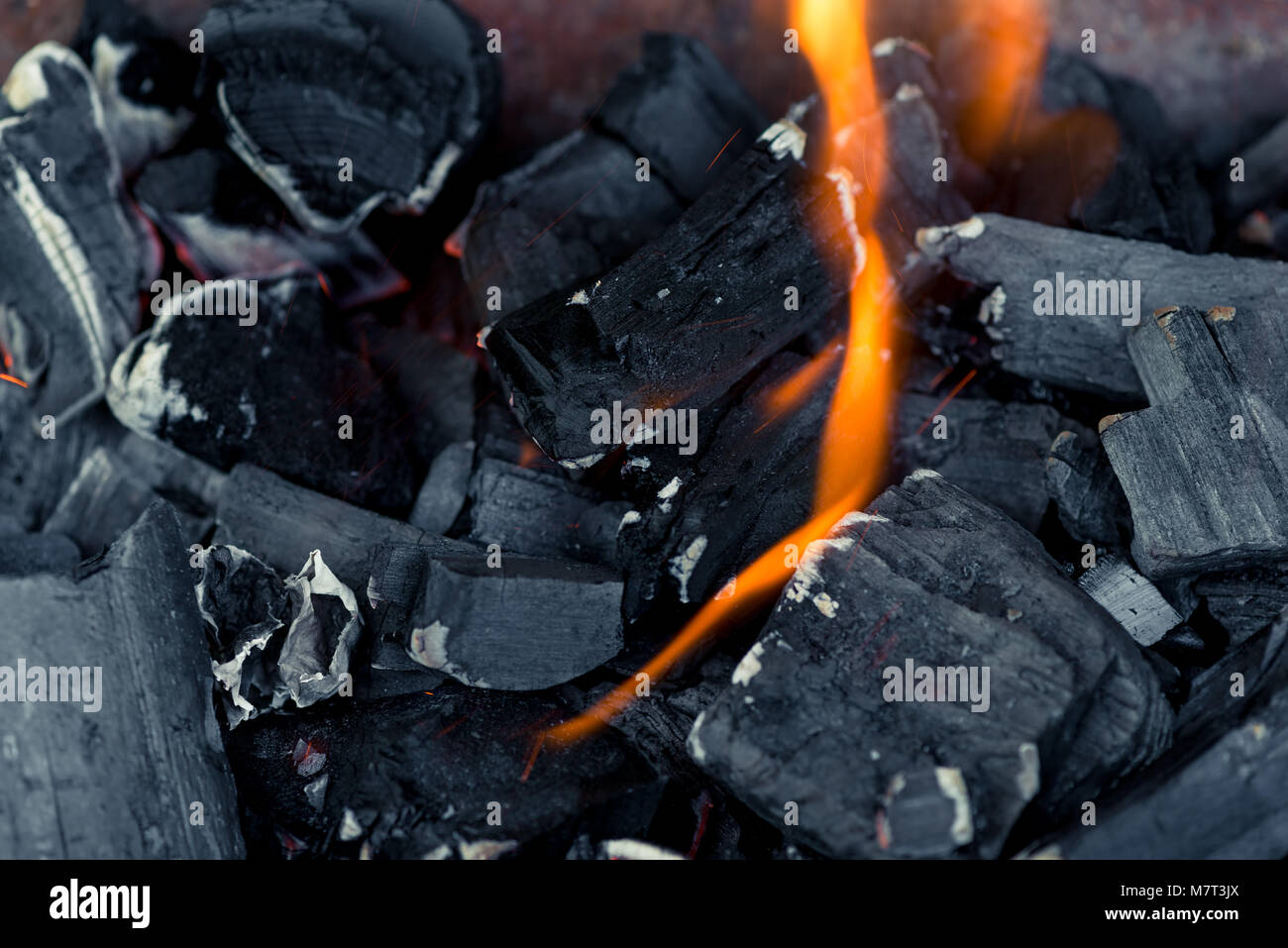 burning natural coals in a fire close up Stock Photo - Alamy