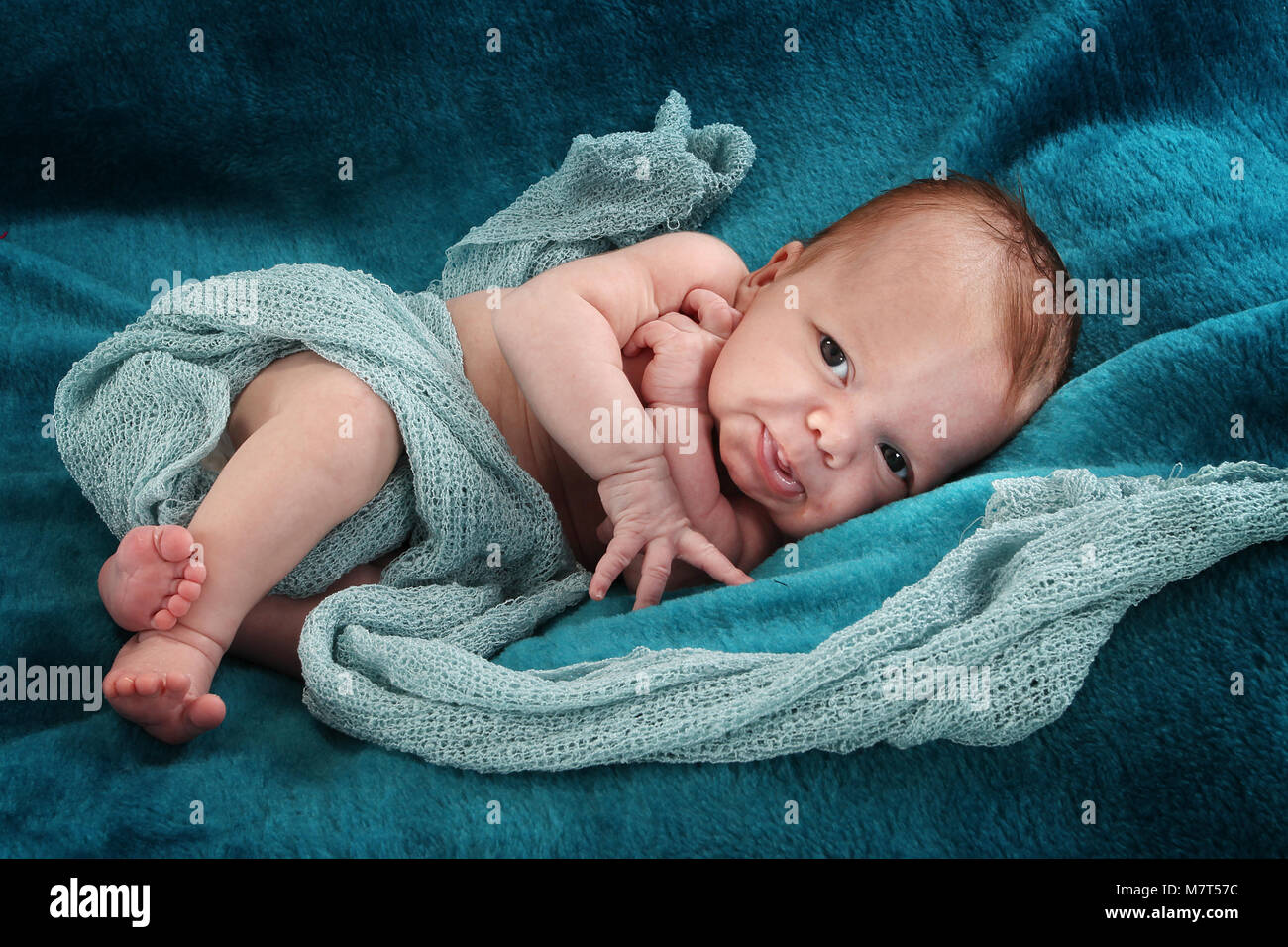 new born baby boy relaxing in nursery Stock Photo - Alamy