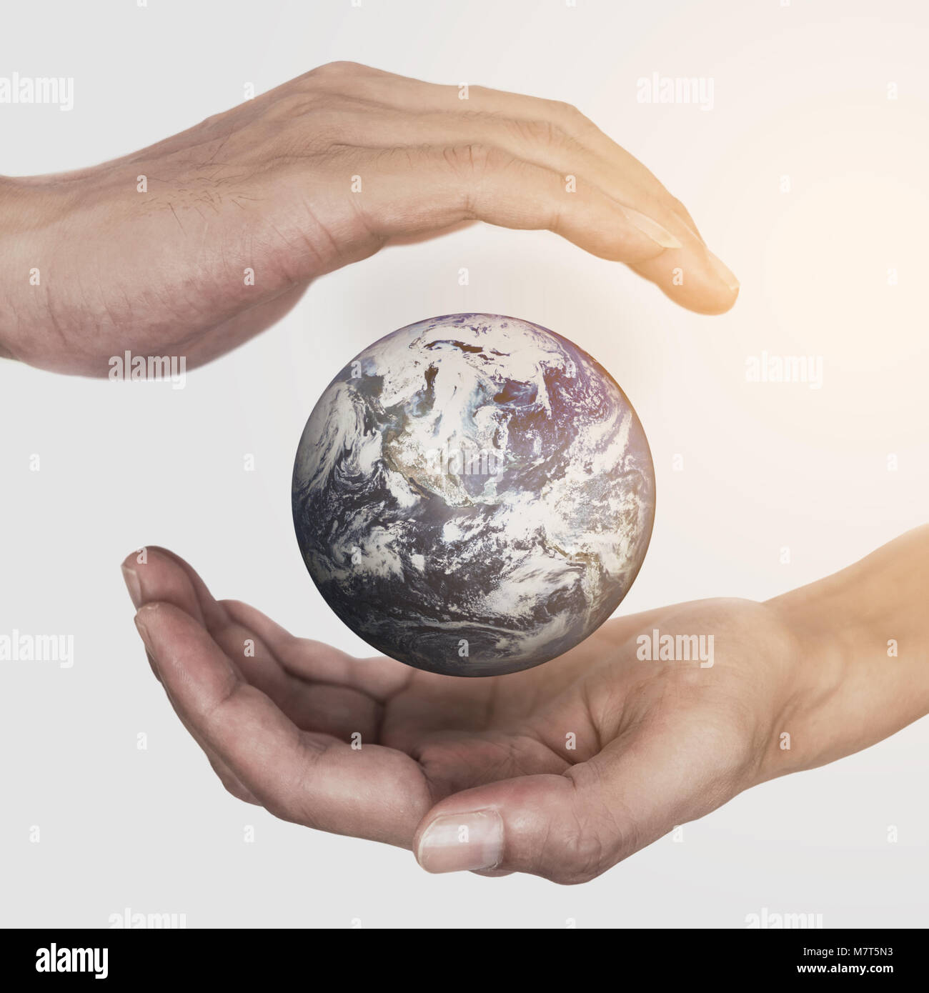 Hands concept for saving environment and save earth. Hands holding and ...