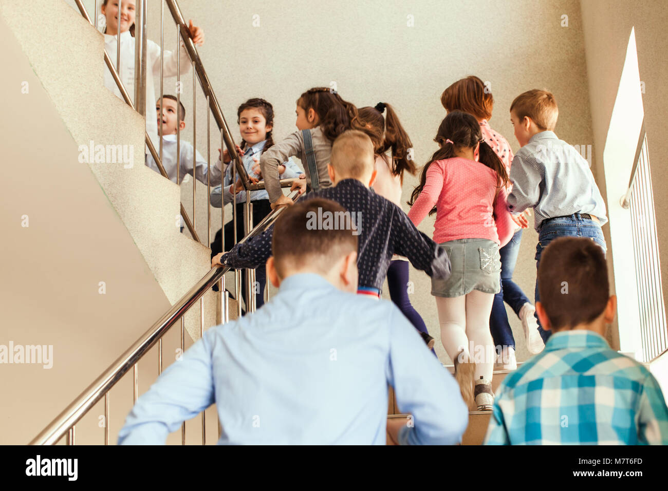 Pupils go upstairs Stock Photo - Alamy