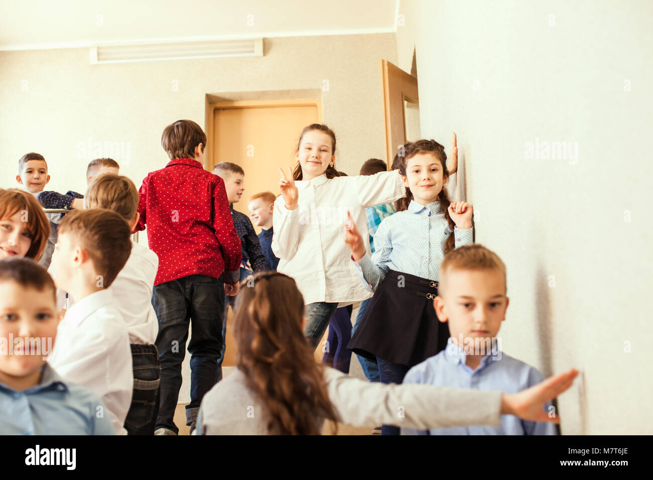 Pupils standing on the stairs Stock Photo - Alamy