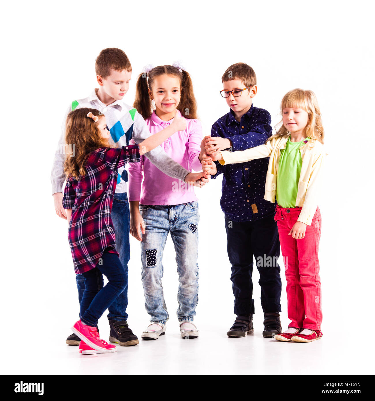 Children with raised hands Stock Photo - Alamy