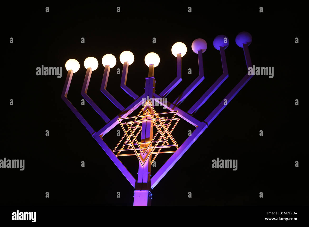 A Hanukkiah, A Menorah with nine branches Stock Photo - Alamy