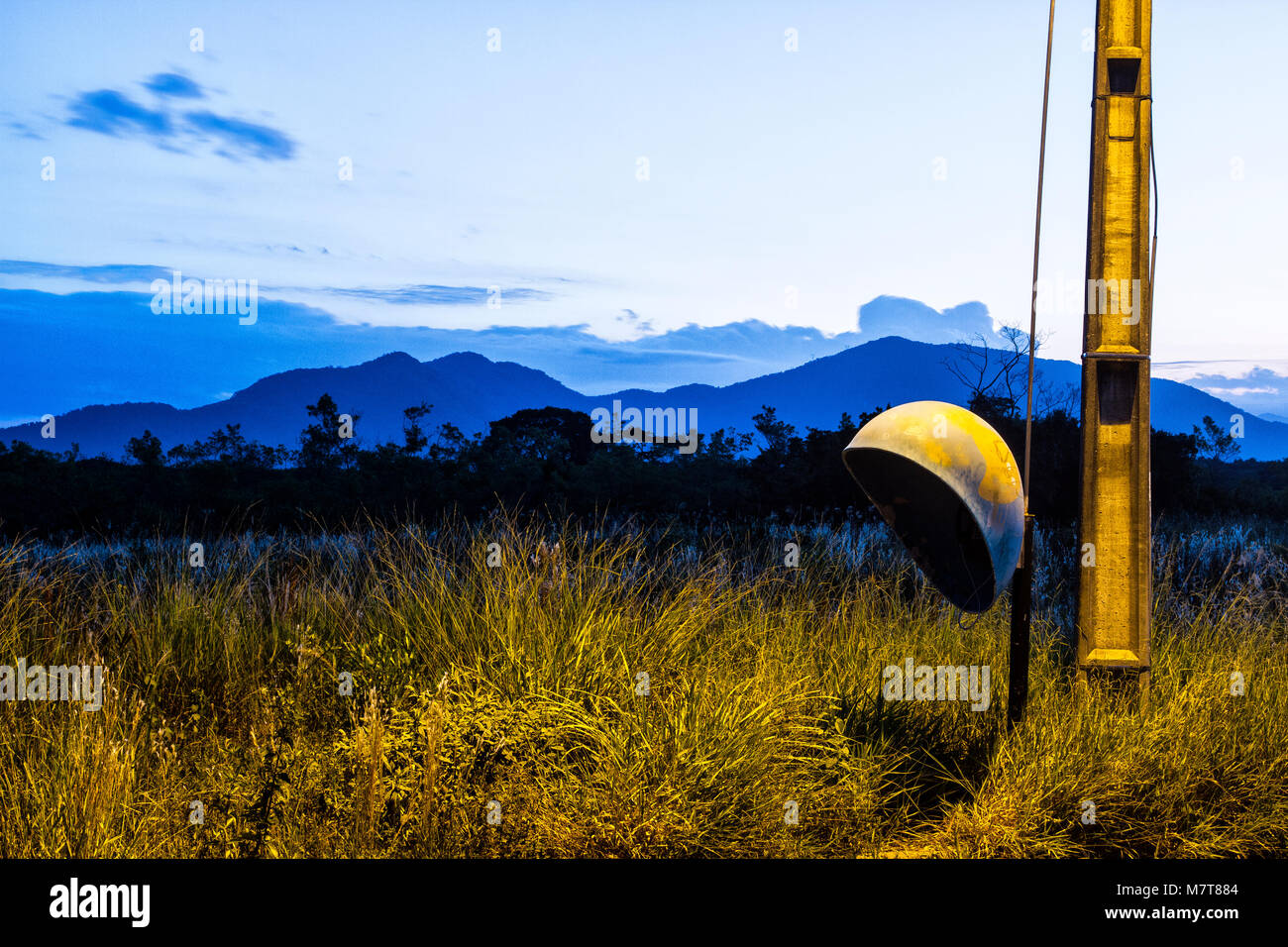 Public phone booth in a vacant lot at evening. Florianopolis, Santa ...