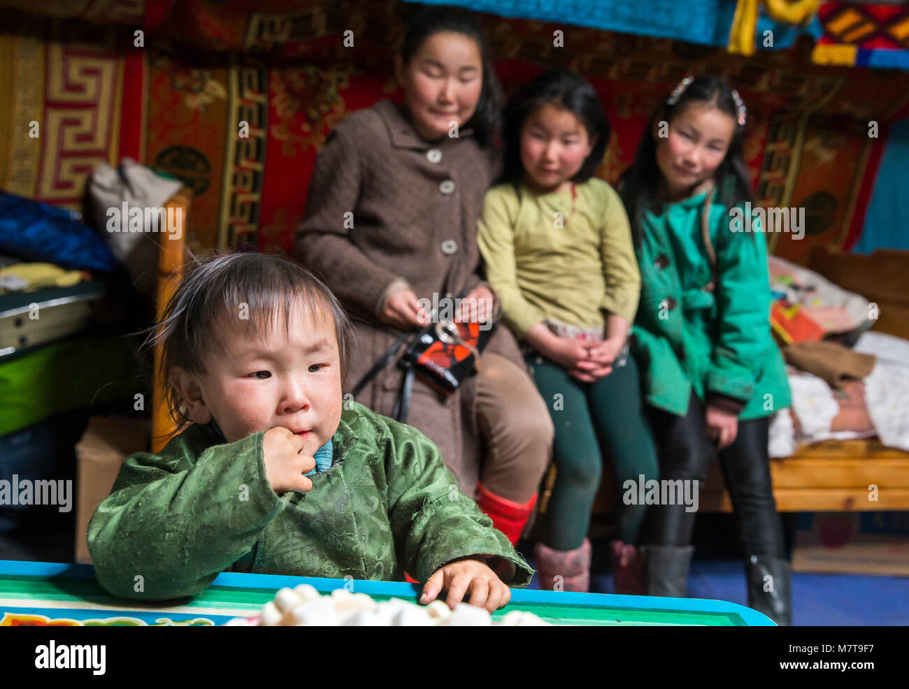 Hatgal, Mongolia, 3rd March 2018: mongolian kids in in their home ger ...