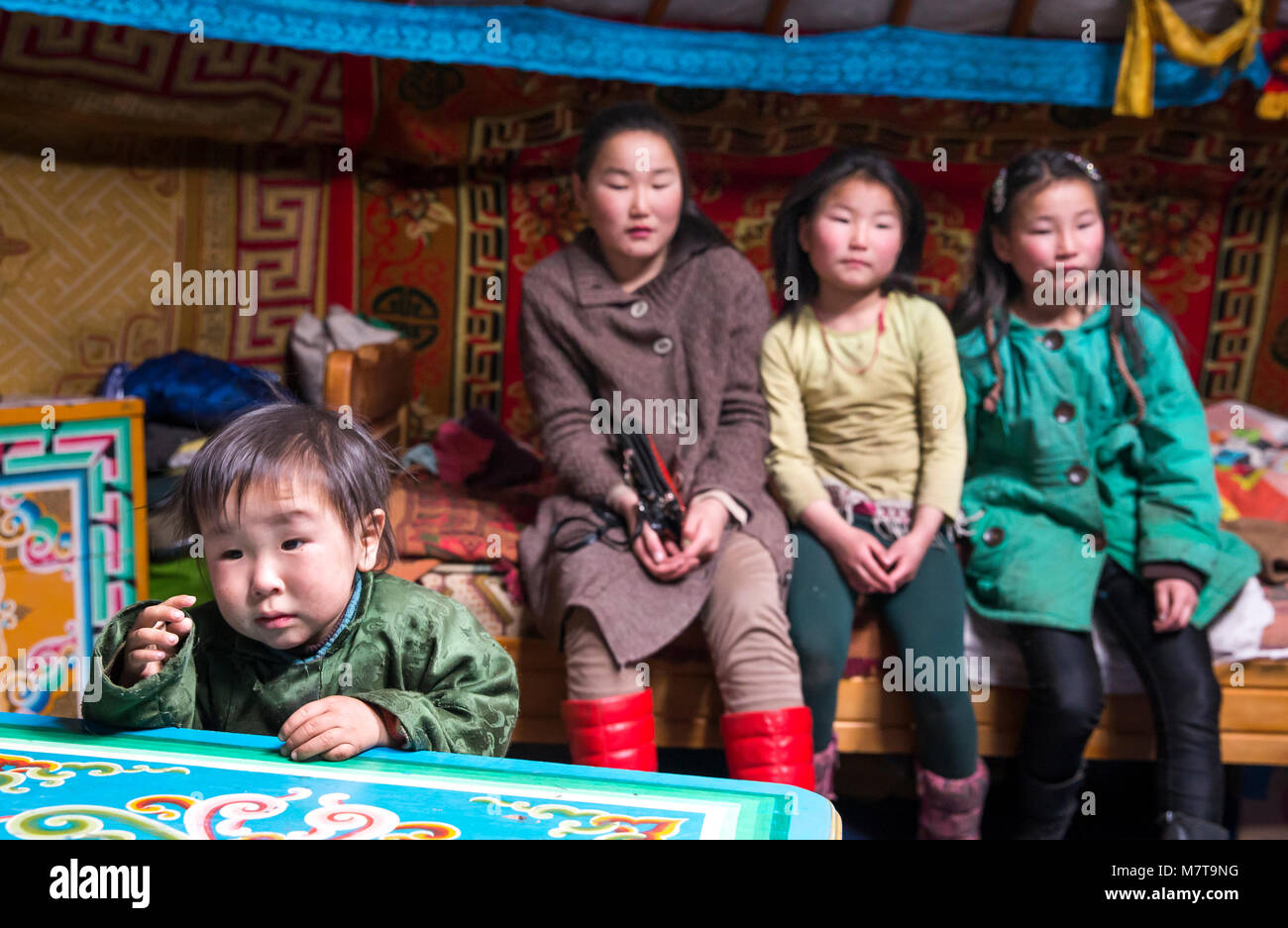 Hatgal, Mongolia, 3rd March 2018: mongolian kids in in their home ger ...