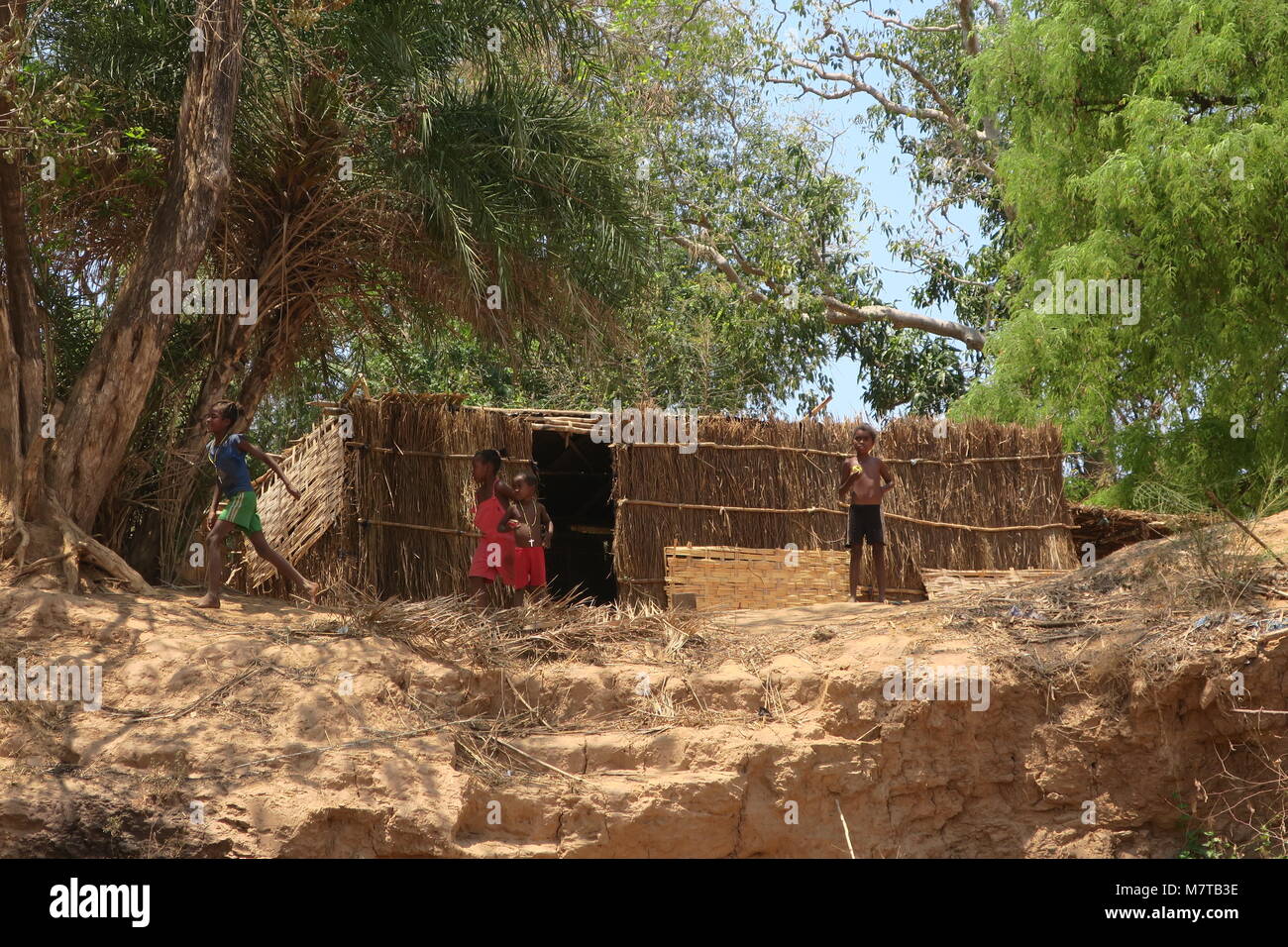 Poverty in Malagasy village. Small simple home on countryside of ...