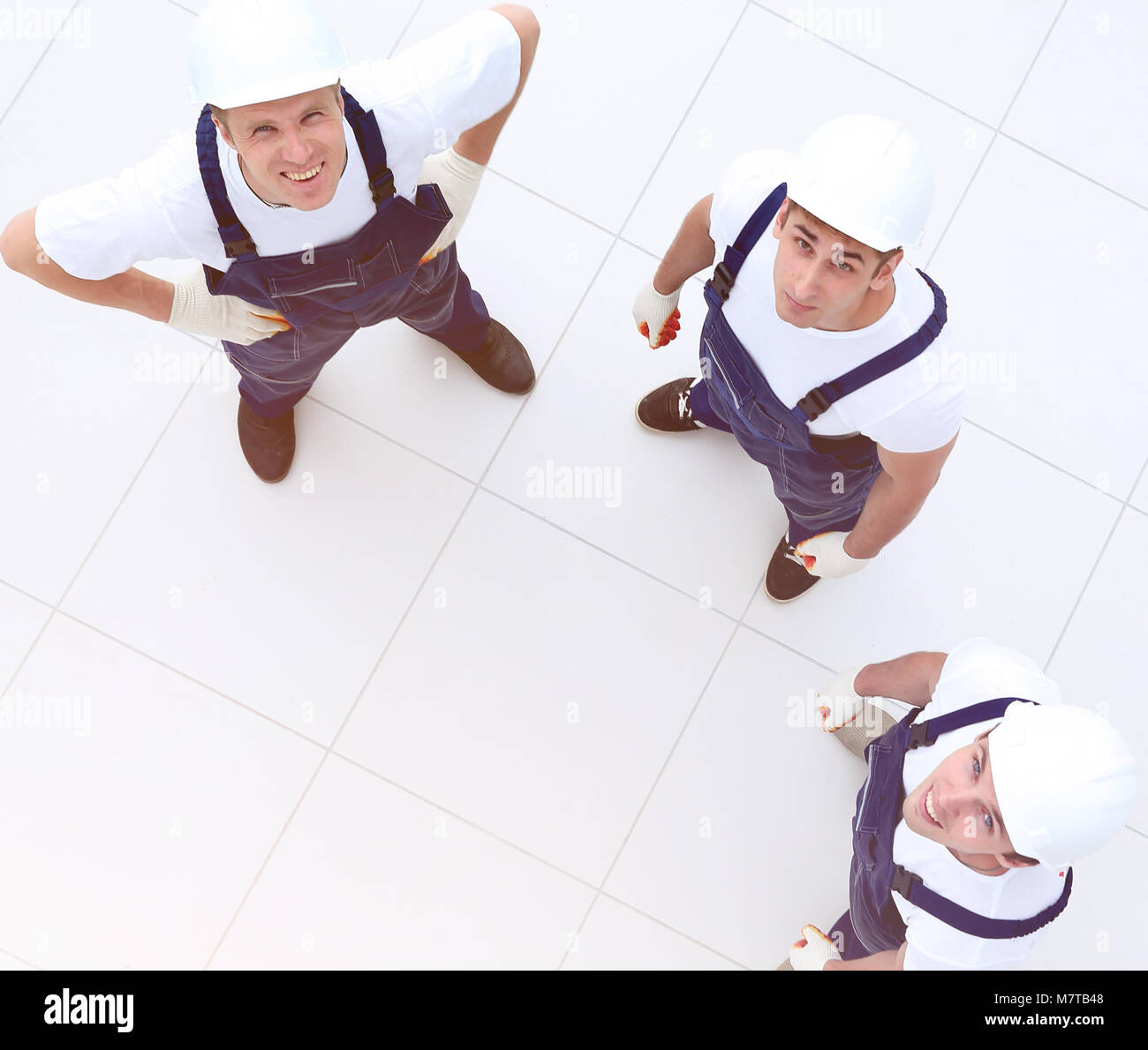 view from the top - group of construction workers Stock Photo - Alamy
