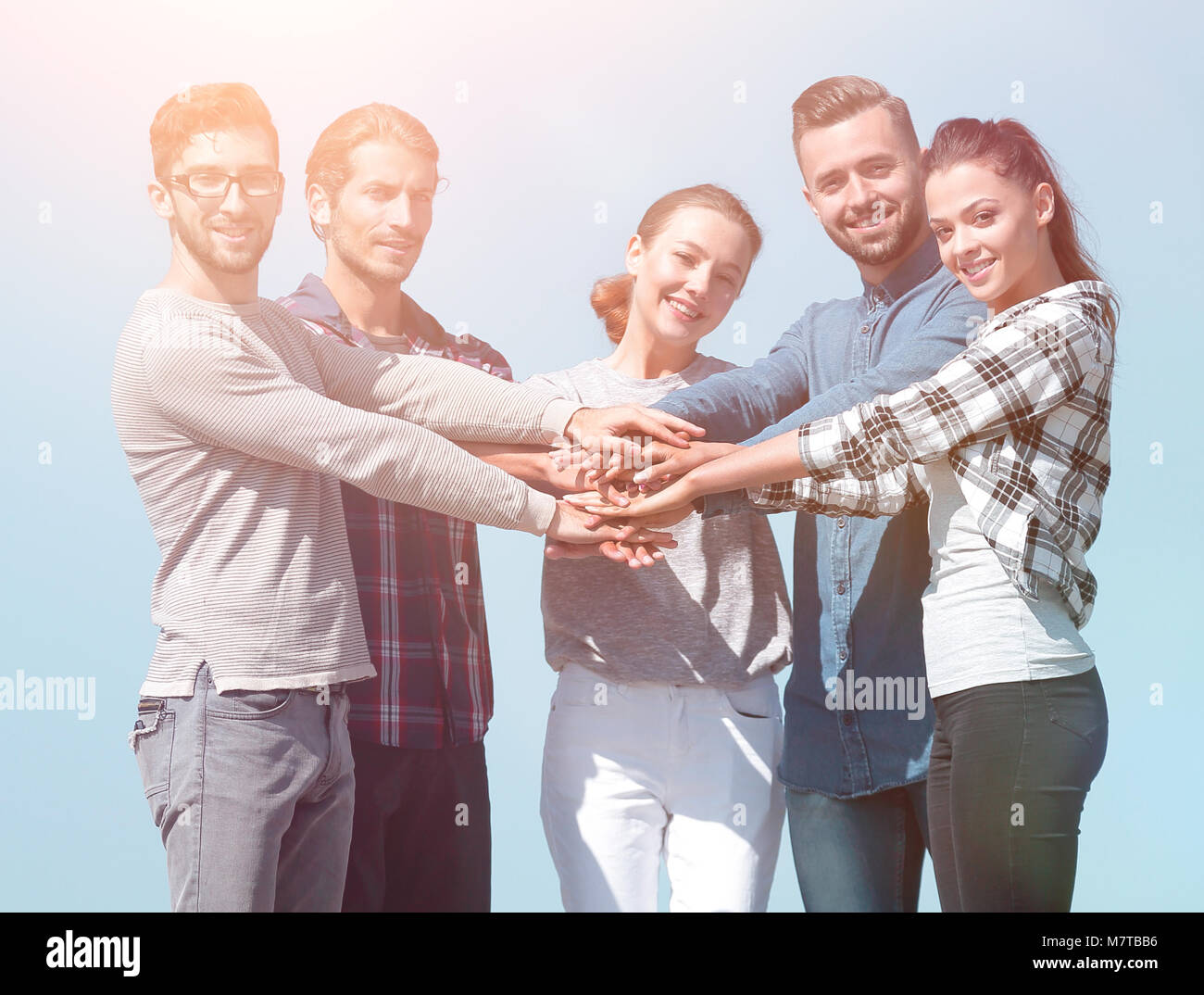 group of young people shows their unity Stock Photo - Alamy