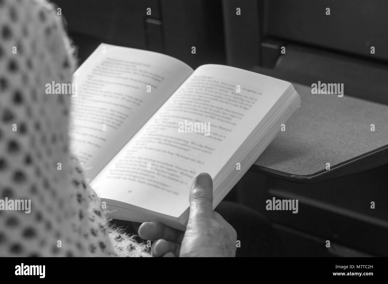 Person open book Black and White Stock Photos & Images - Alamy