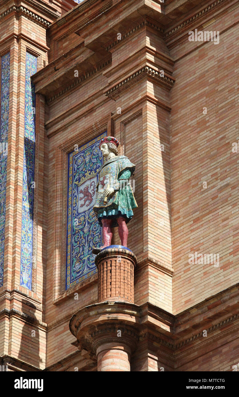 Statue on the main building at Plaza de Espana in Seville Stock Photo ...