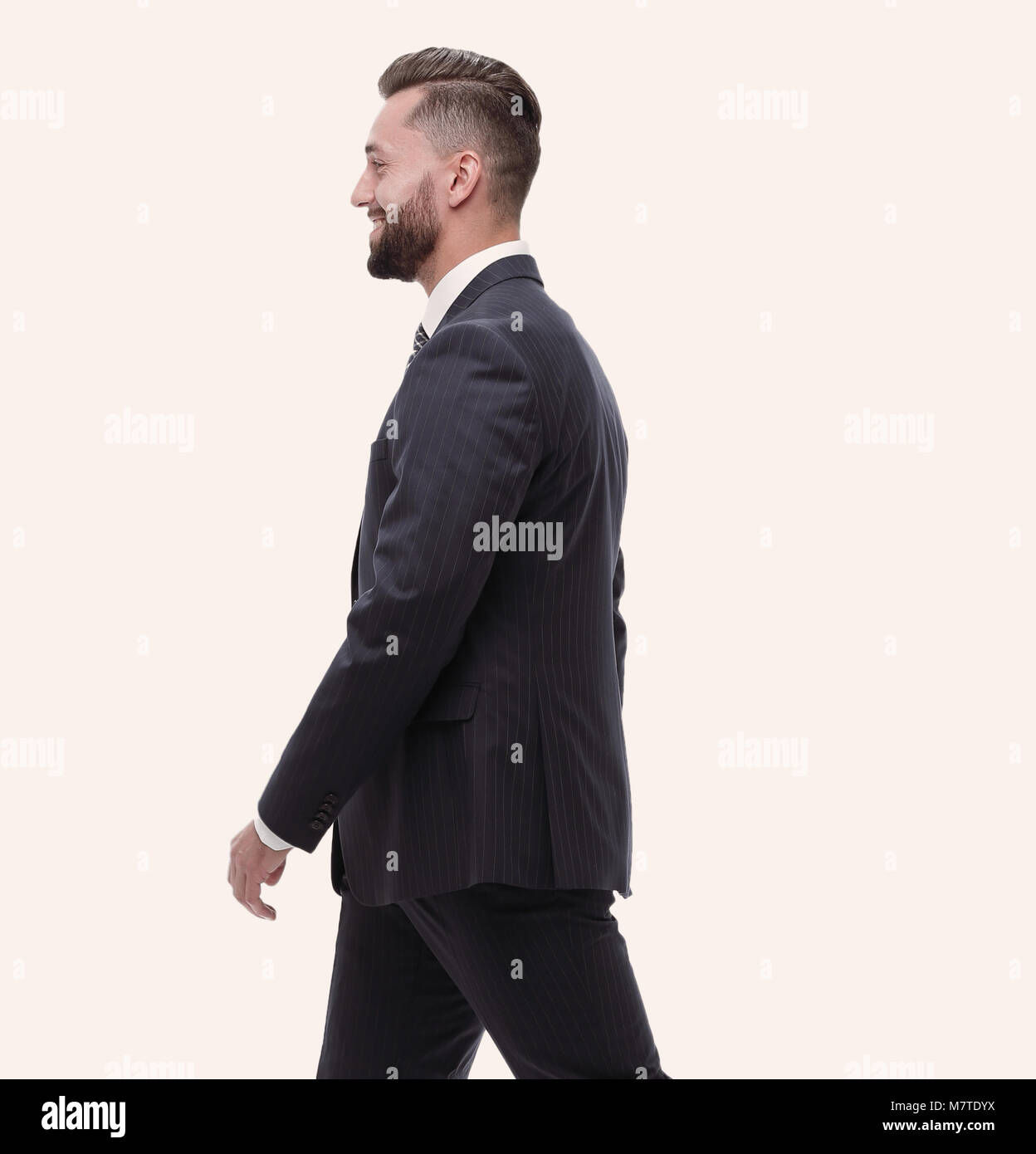side view of confident businessman Stock Photo - Alamy