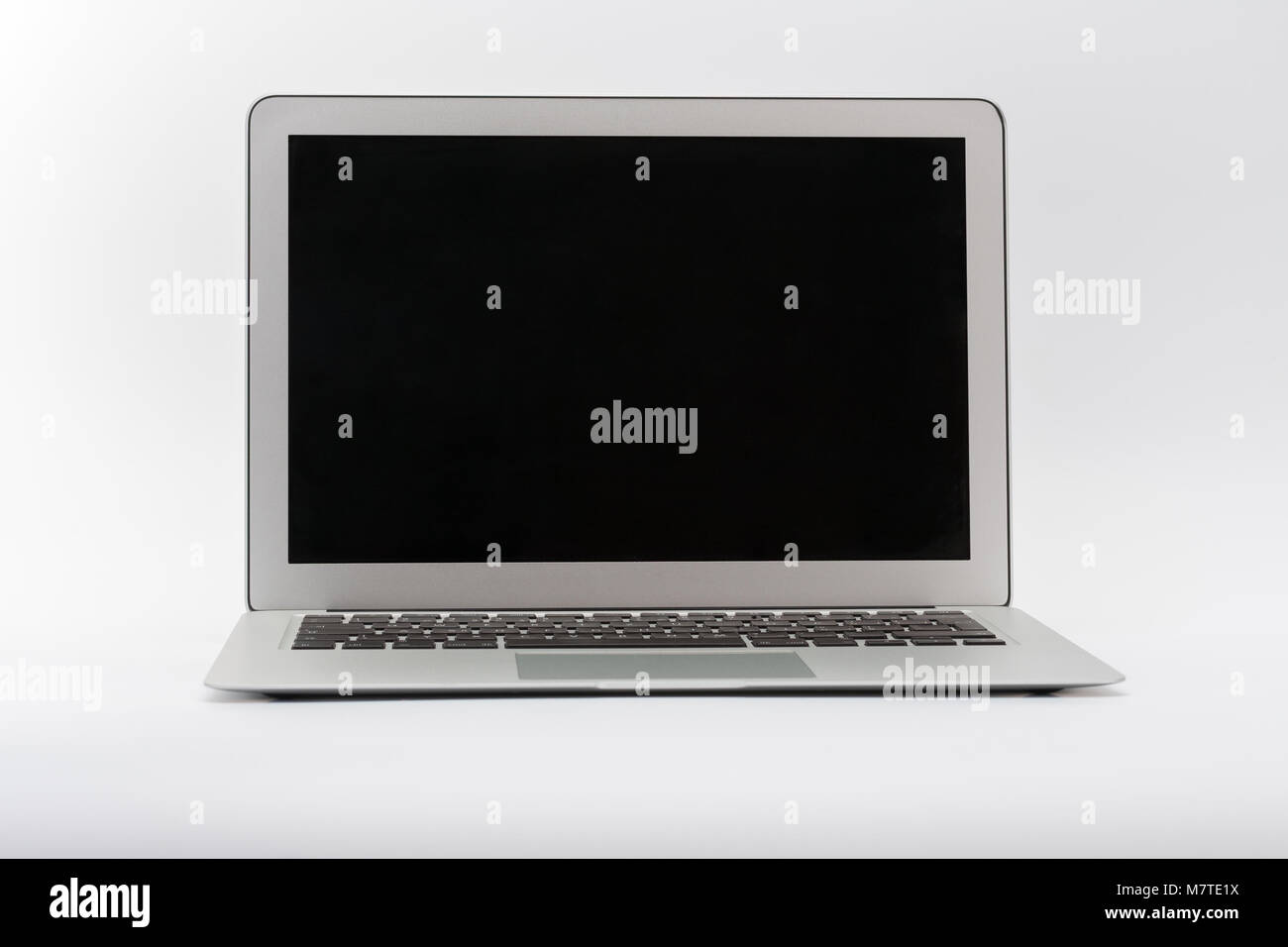 Open modern, new laptop on white background, front view, blank black ...