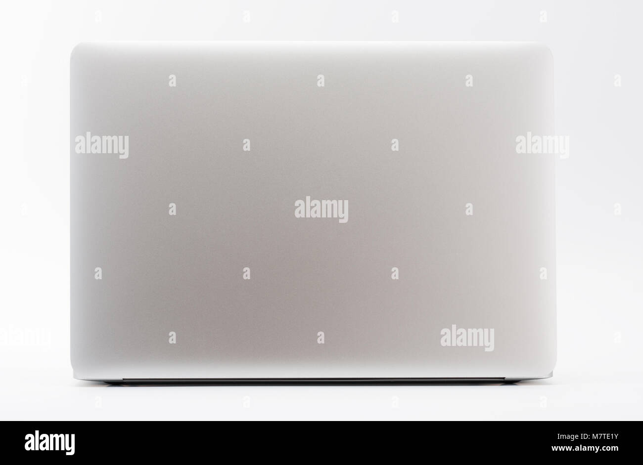 Modern new laptop on white background, back view Stock Photo - Alamy