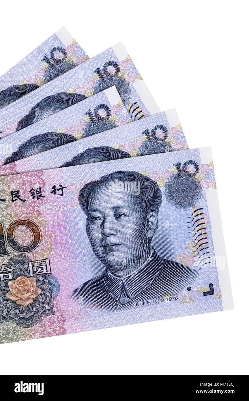 Several Chinese Ten Yuan currency bills isolated on a white background ...