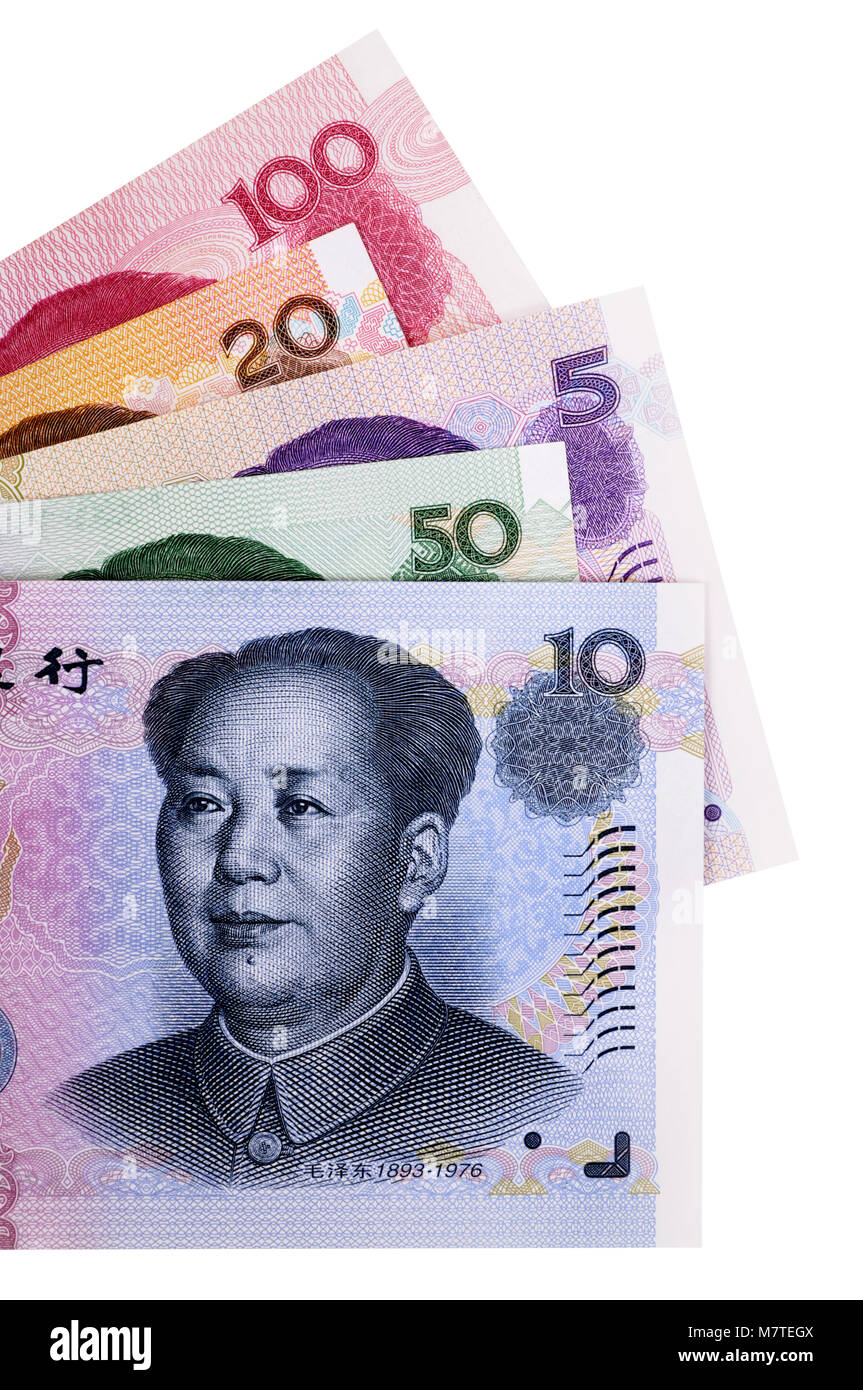 Selection of different Chinese Yuan currency bills isolated on a white ...