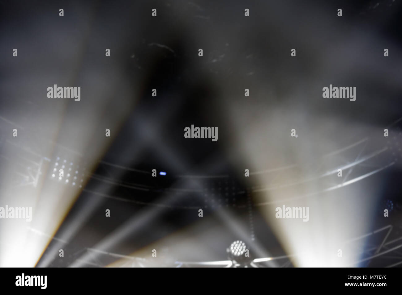 White beams of stage light during a show Stock Photo - Alamy