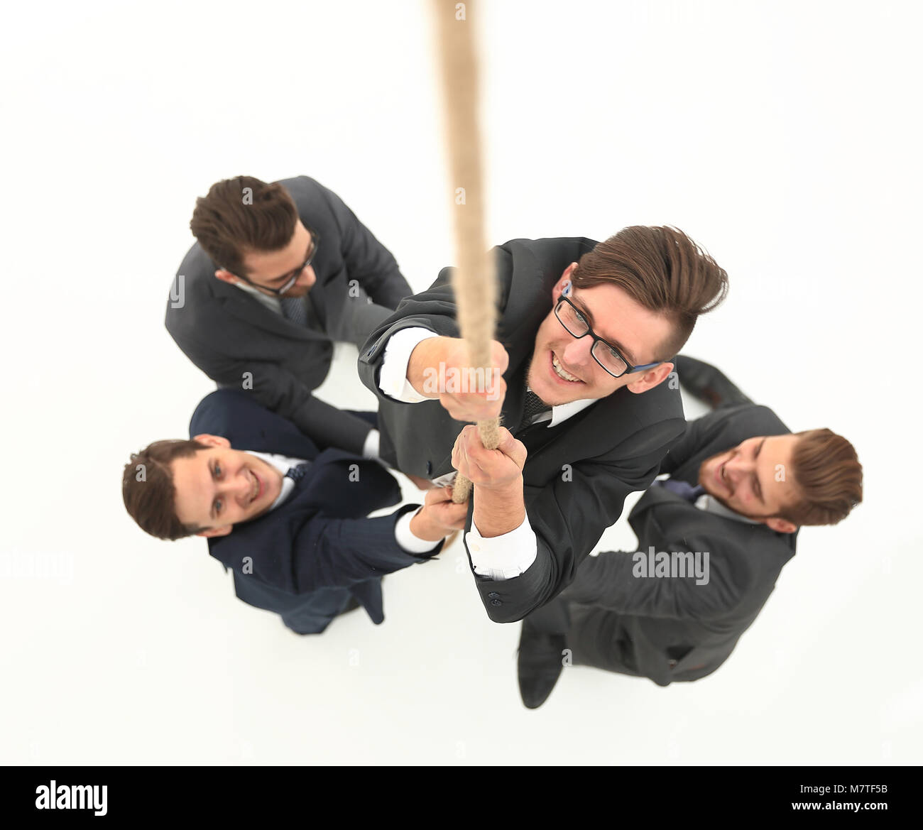 business team helping the leader to climb the rope Stock Photo - Alamy