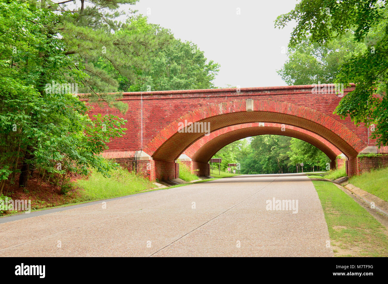 Built solidly from red brick, these bridges span this country road here ...