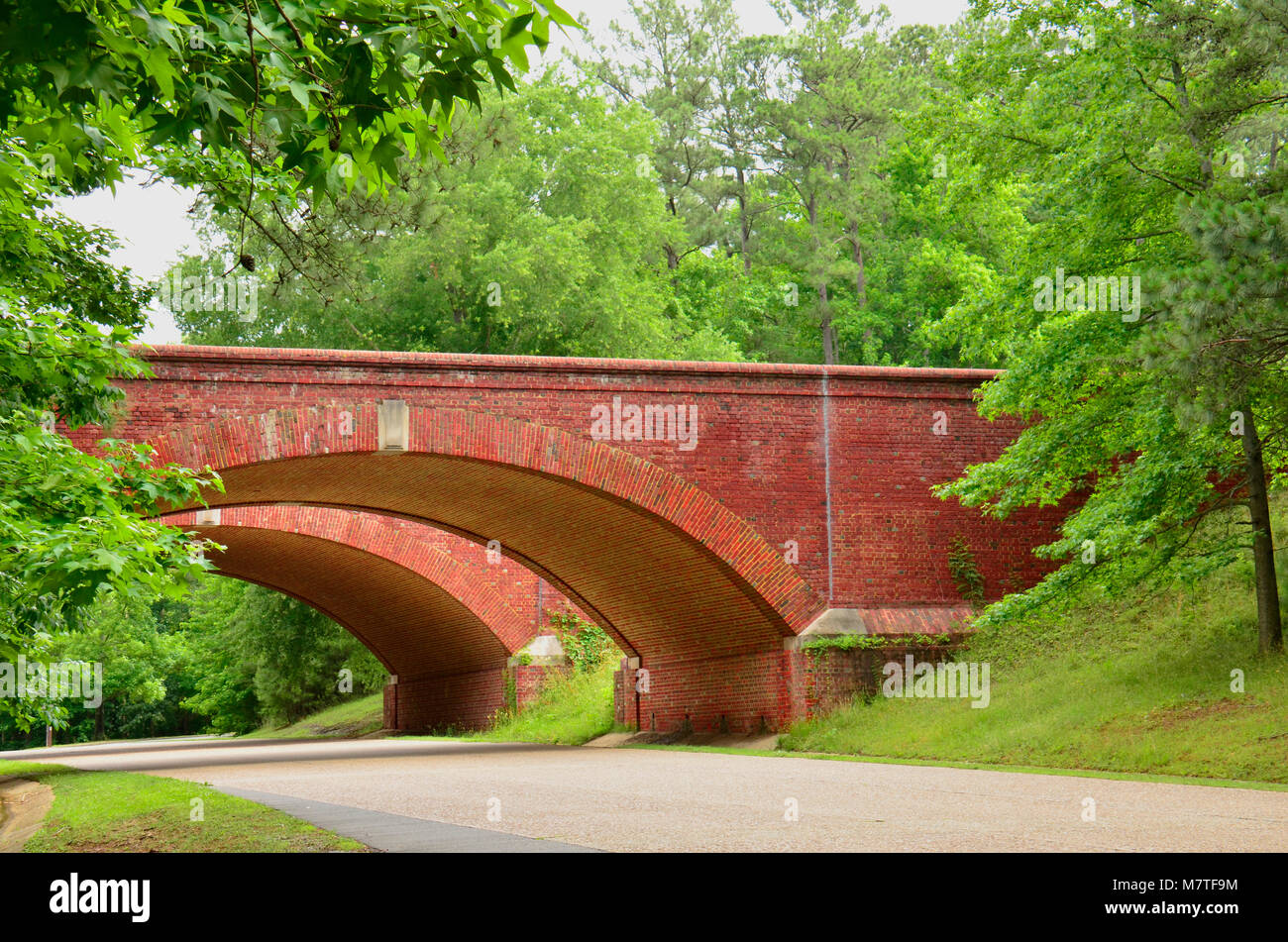 Built solidly from red brick, these bridges span this country road here ...