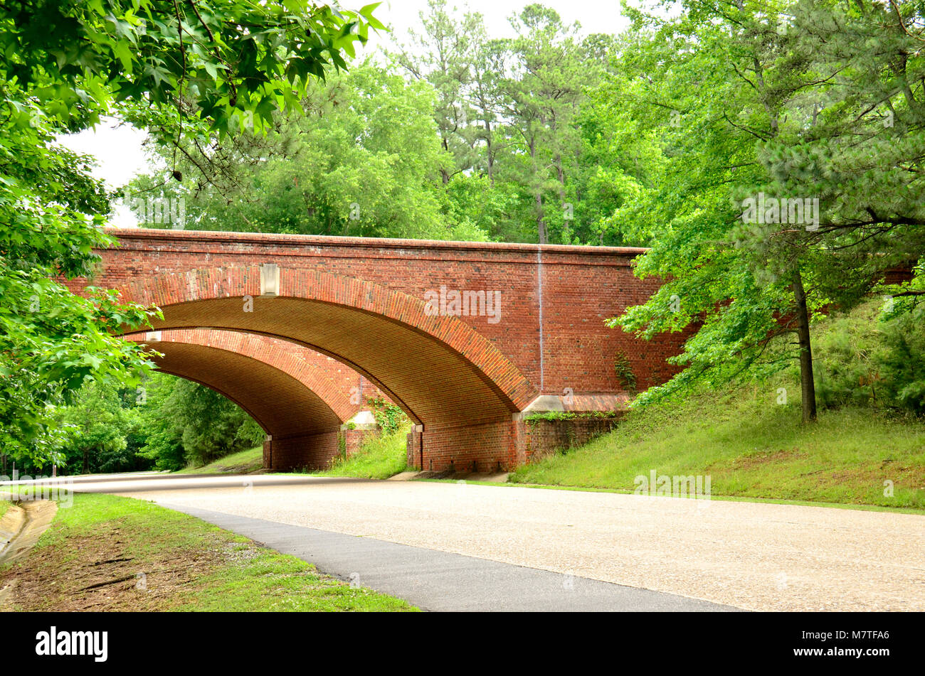 Built solidly from red brick, these bridges span this country road here ...