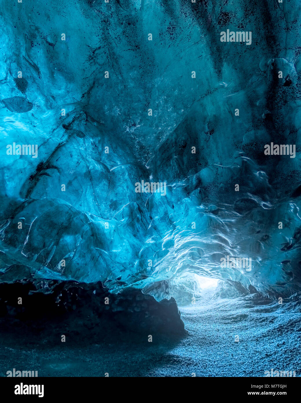 Interior of a blue ice cave at the Vatnajokull Glacier, the largest ...
