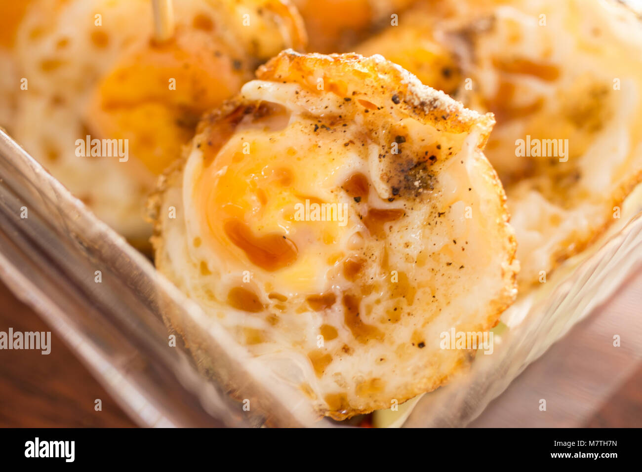 Fried Chicken egg in plastic box Stock Photo - Alamy