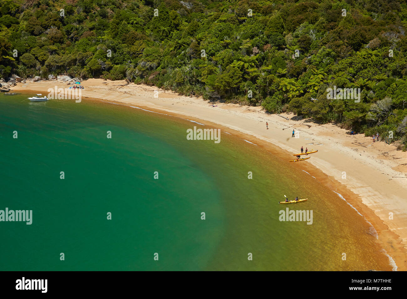 Kayaks and boat, Te Pukatea Bay, Abel Tasman National Park, Nelson Region, South Island, New ...